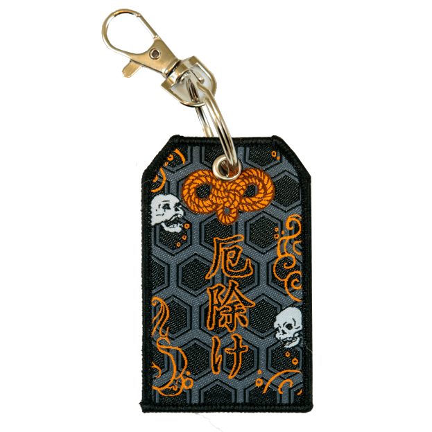 KEYCHAIN – OMAMORI (ORANGE FLAME ONI) – Iron Yokai